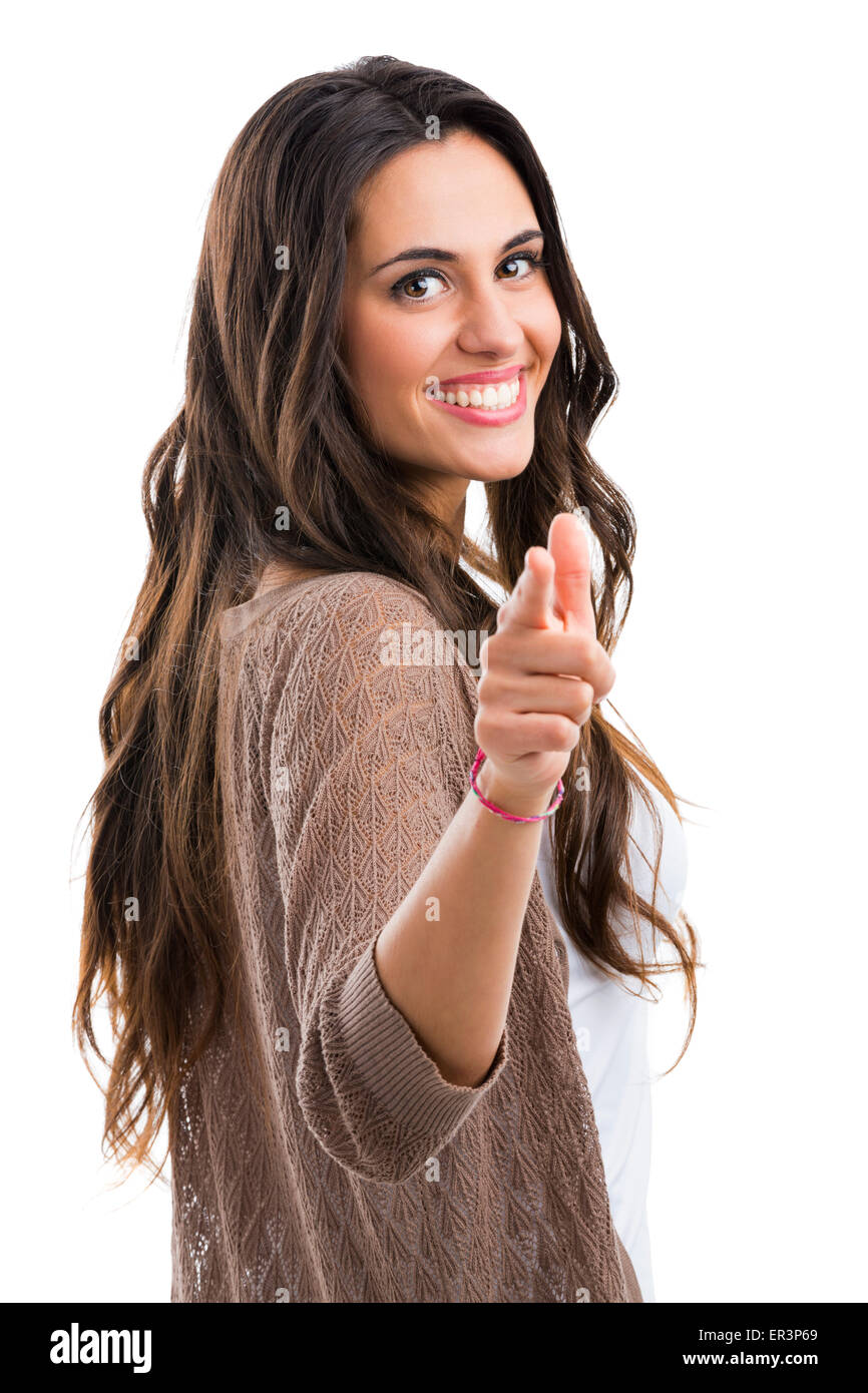 Beautiful woman smiling and pointing, isolated on white Stock Photo - Alamy