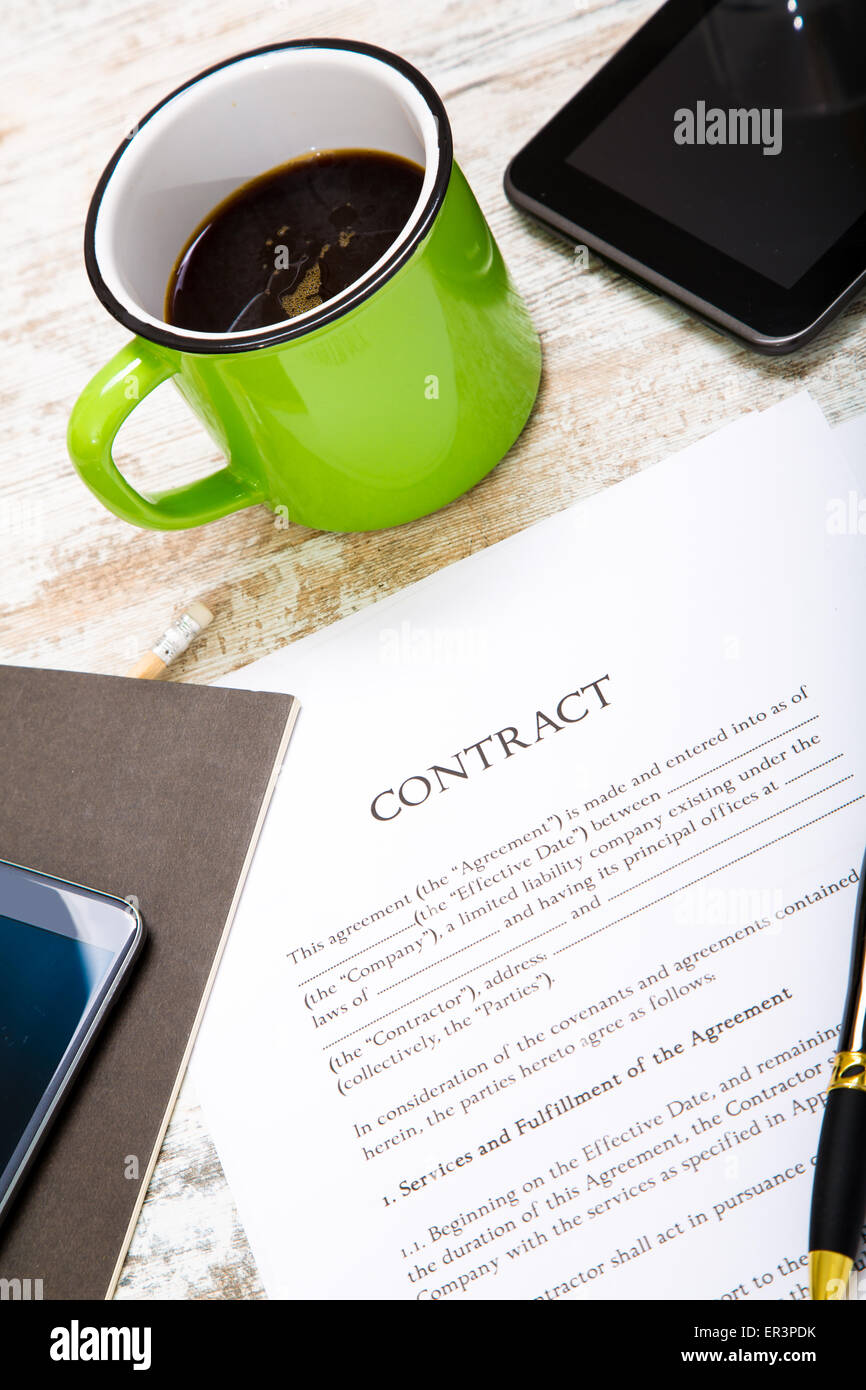 Reading a Contract before signing Stock Photo - Alamy