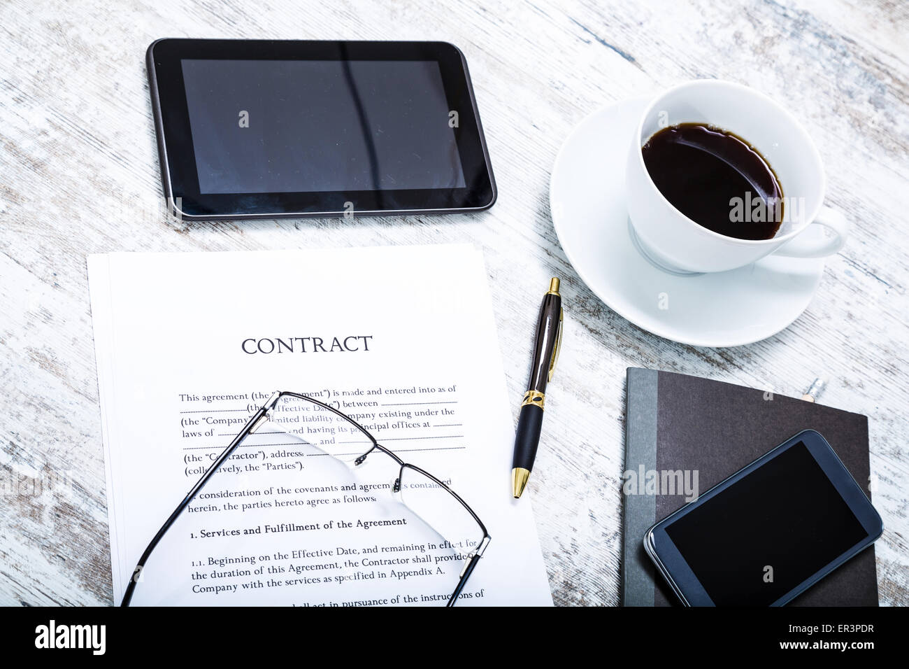 Reading a Contract before signing Stock Photo - Alamy