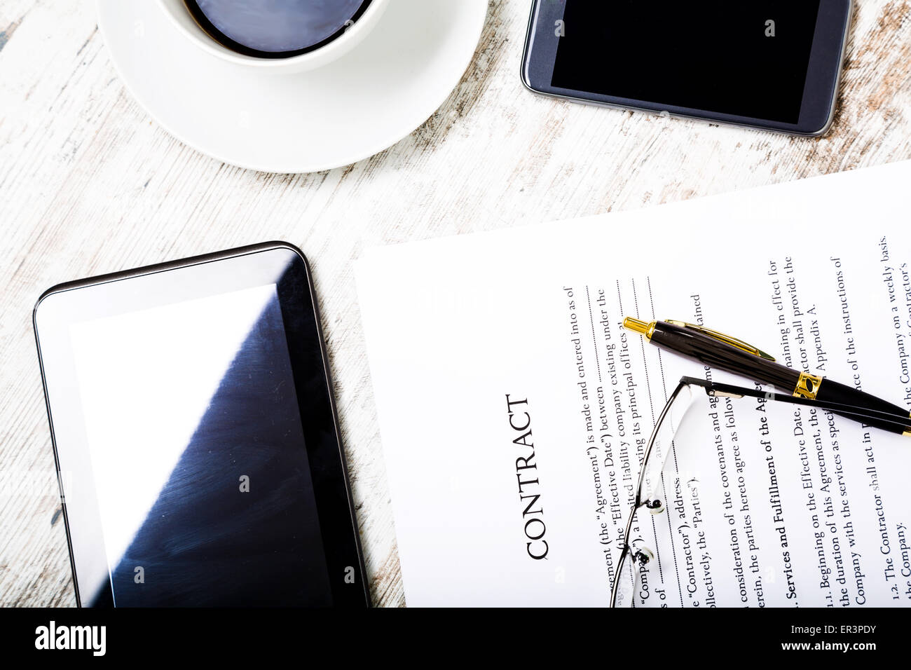 Reading a Contract before signing Stock Photo - Alamy