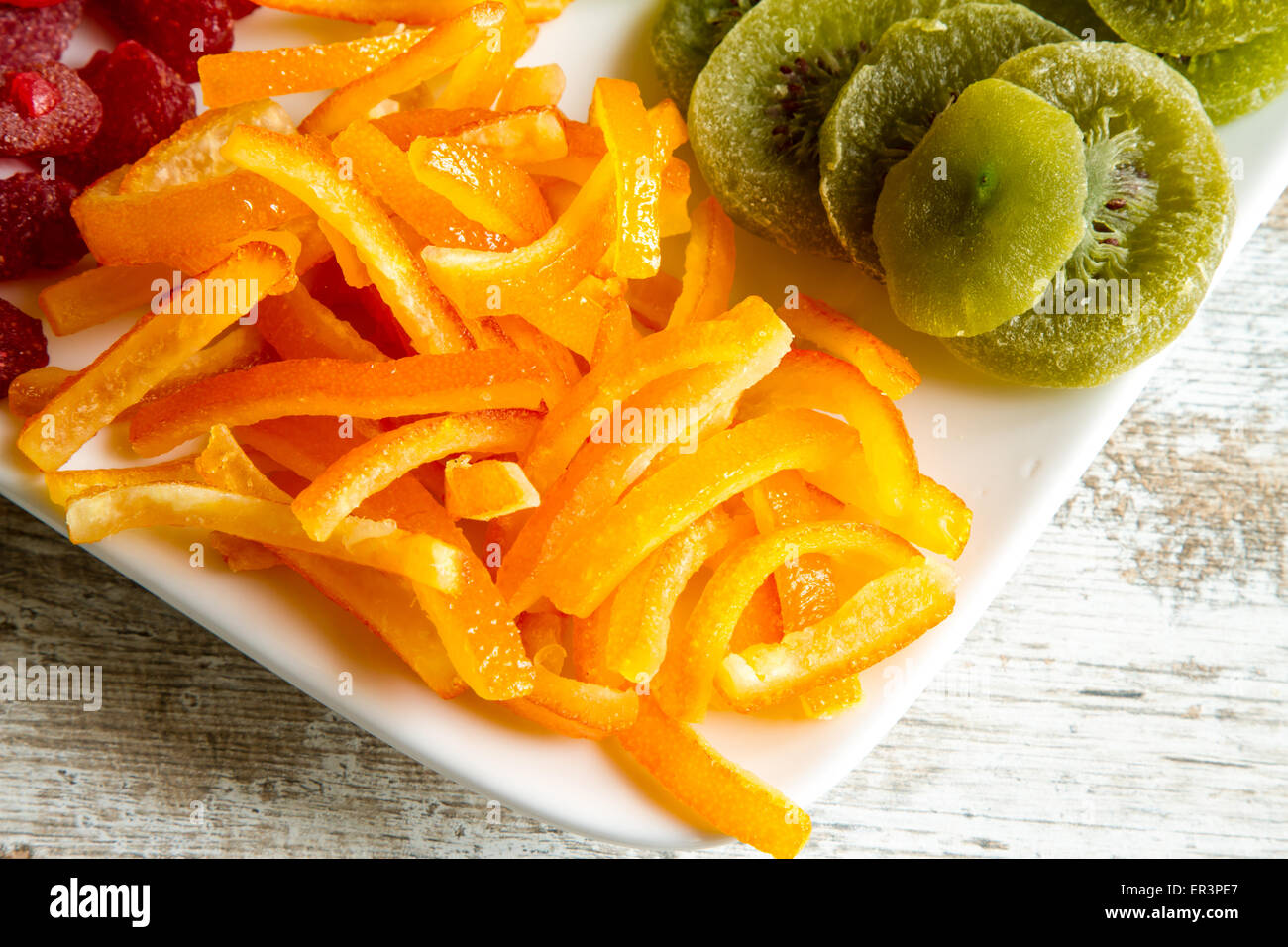 Selection of colorful dried fruits background Stock Photo - Alamy