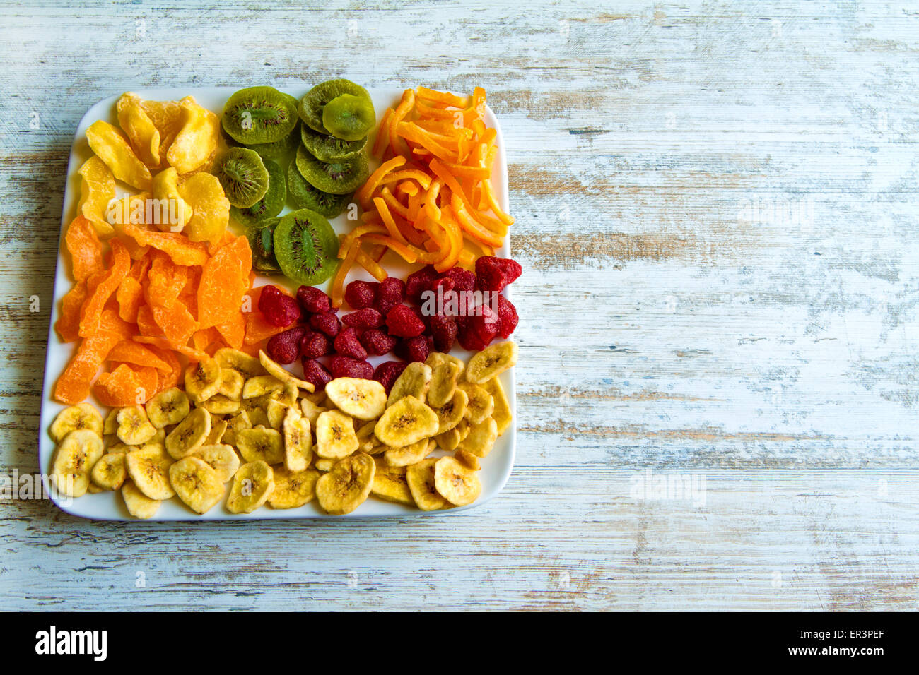 Selection of colorful dried fruits background Stock Photo - Alamy