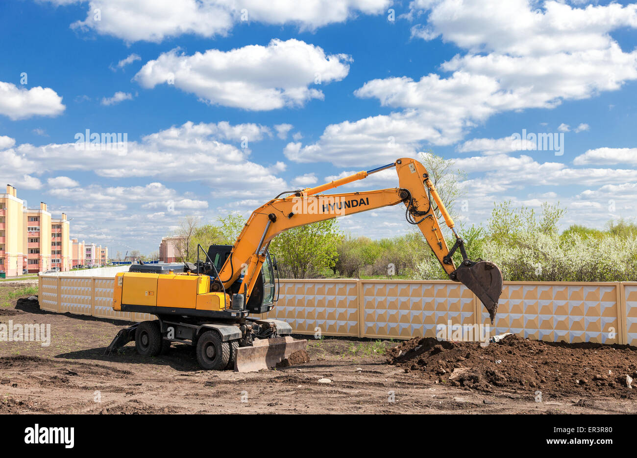 Hyundai excavator at construction site in summer sunny day Stock Photo ...