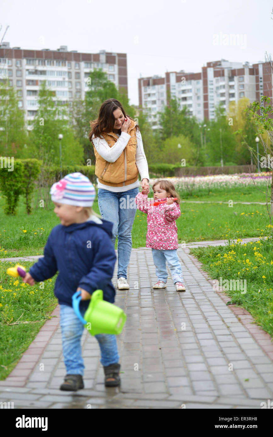 Mother And a Daughter Walking Along Path Stock Photo - Alamy
