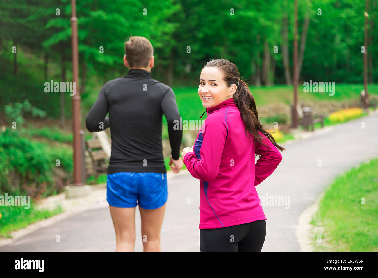Young sporty couple running outdoors hi-res stock photography and ...