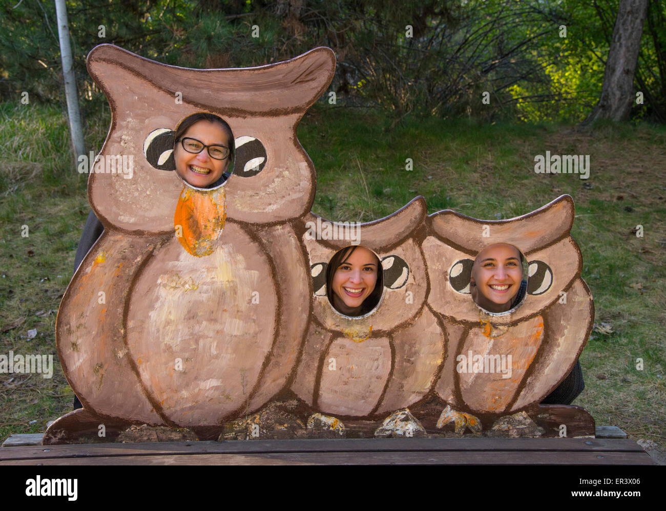 MK Nature Center, Girls peaking out of Owls Statues. boise, Idaho Stock ...