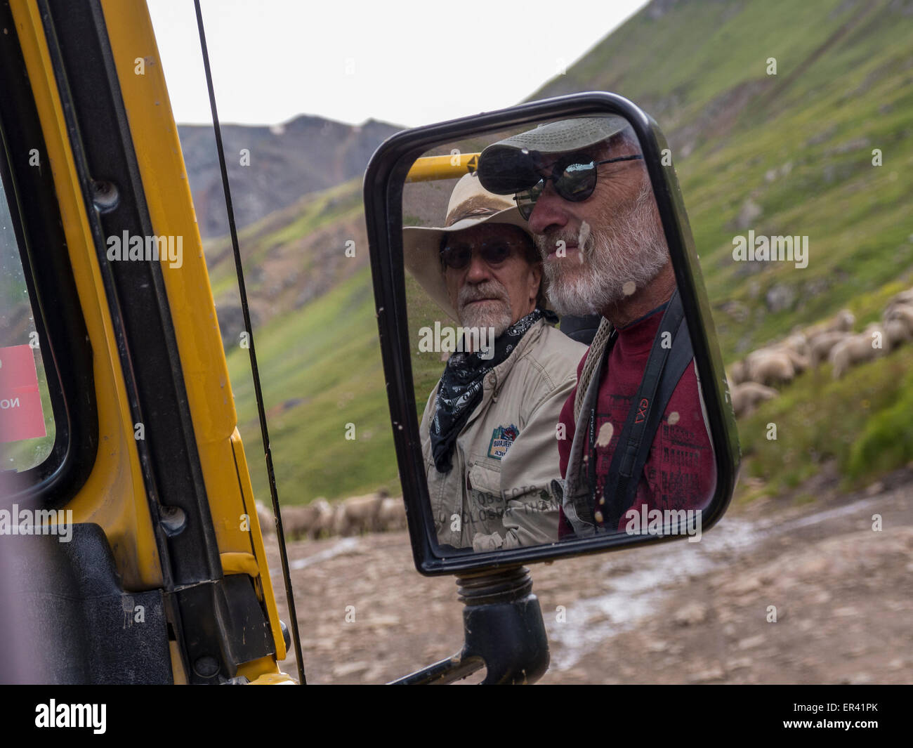 Driver and rider in a muddy side mirror, Alpine Loop, Colorado Stock ...