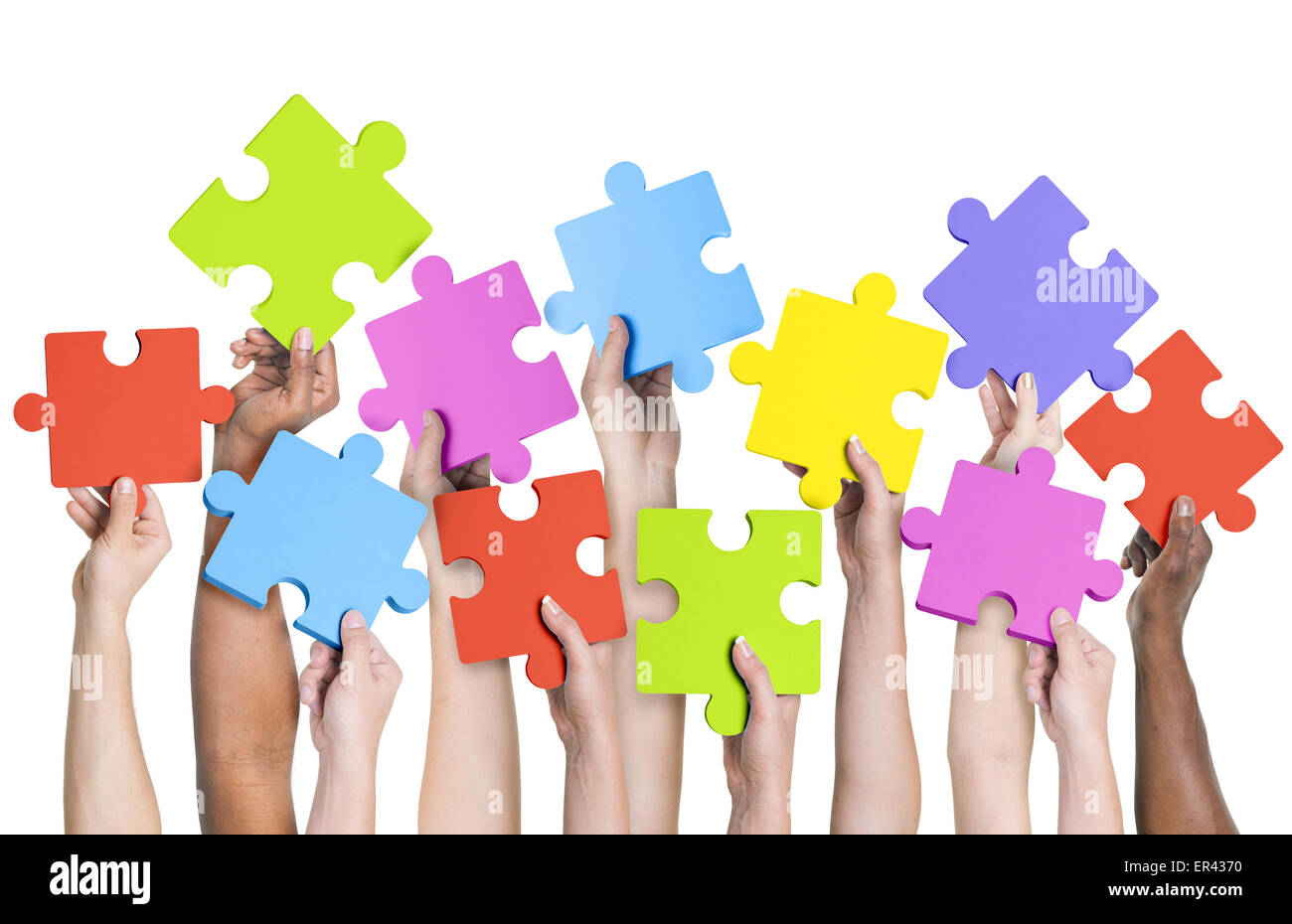 Human hands holding jigsaw puzzle Stock Photo - Alamy