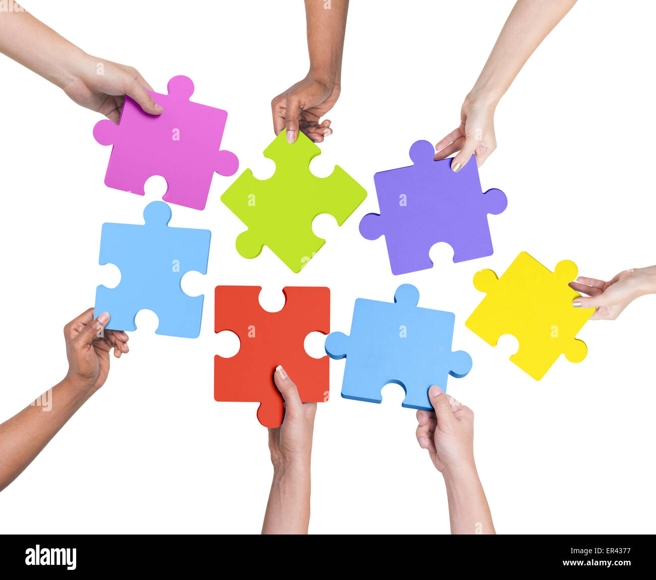 Human hands holding jigsaw puzzle Stock Photo - Alamy