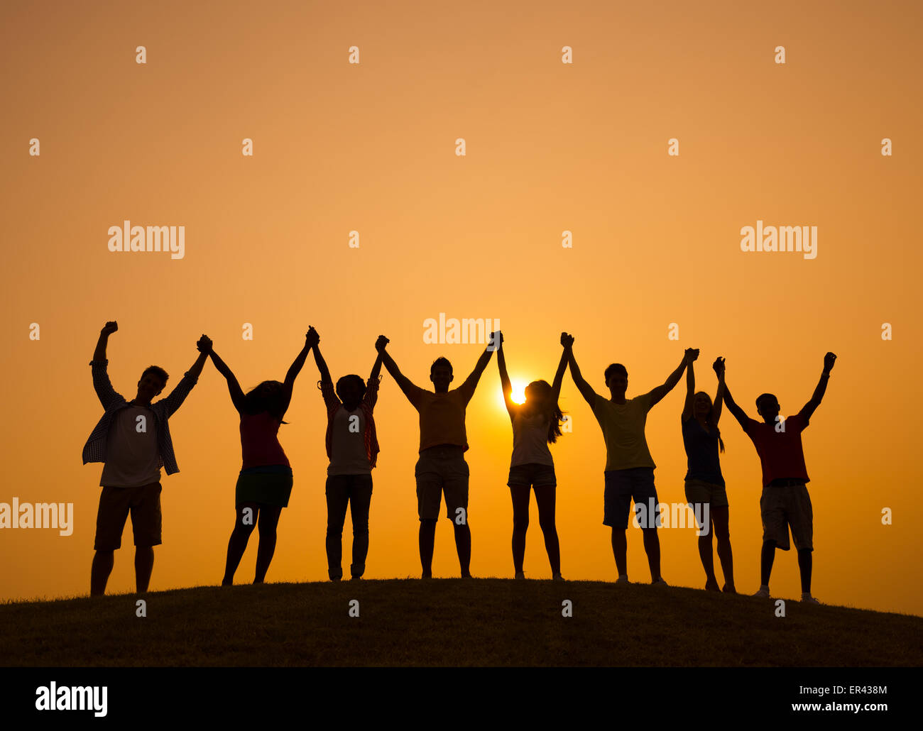 People at sunset Stock Photo - Alamy