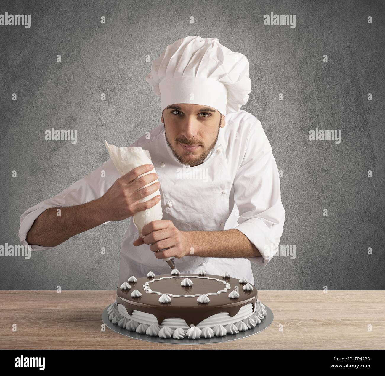 Pastry cook prepares a cake Stock Photo - Alamy