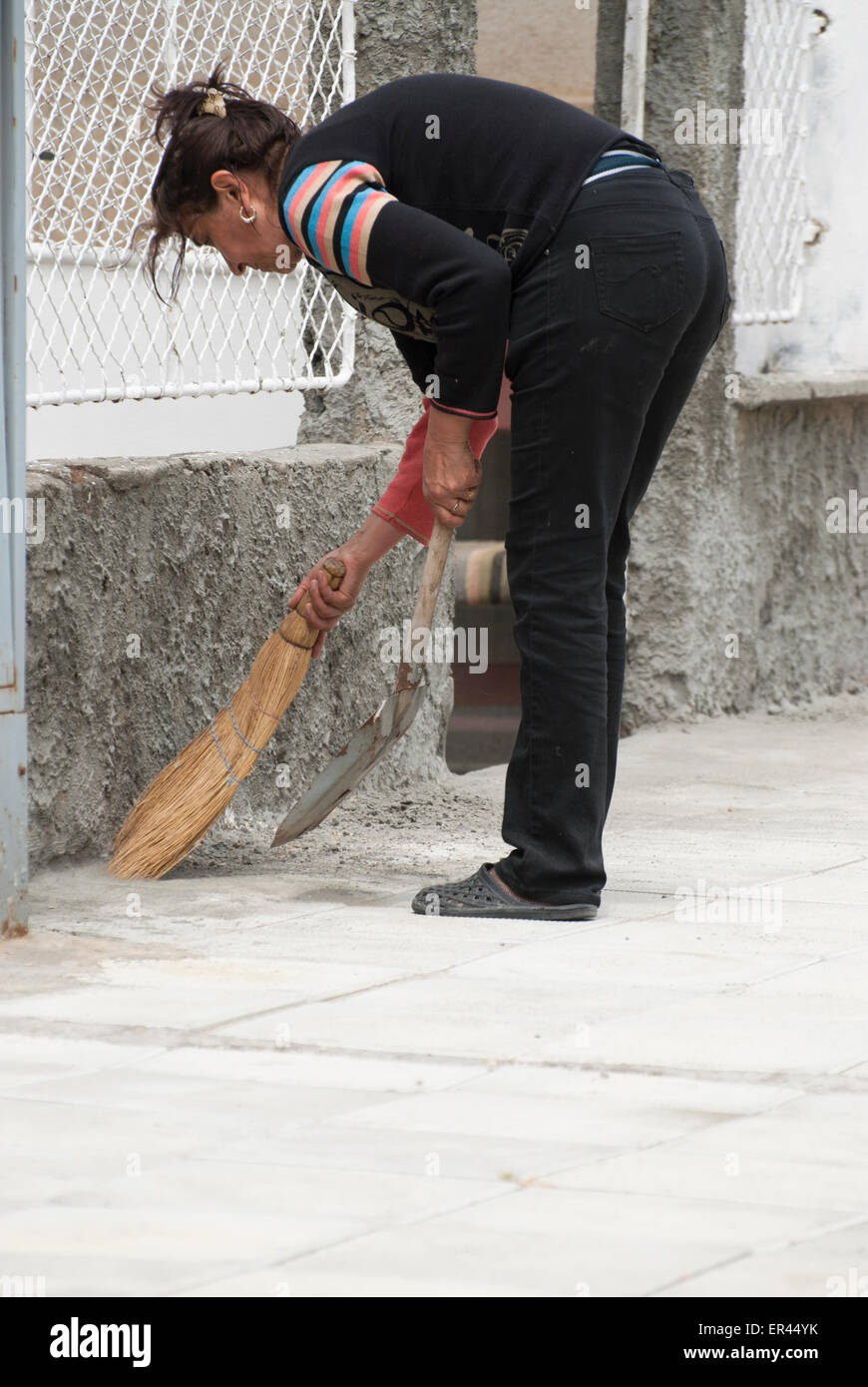 Sweeping up sand hi-res stock photography and images - Alamy