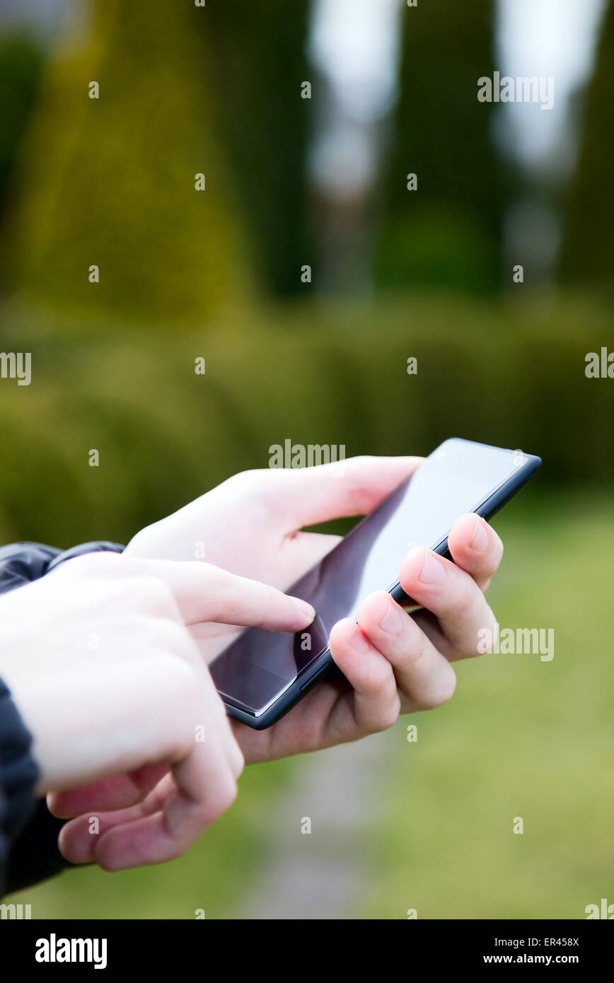 Man touching green mobile screen hi-res stock photography and images ...