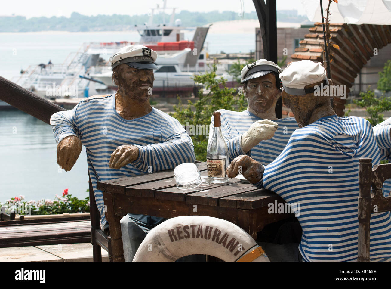 Dummy sailors at the table of the restaurant in old Nessebar, Bulgaria ...