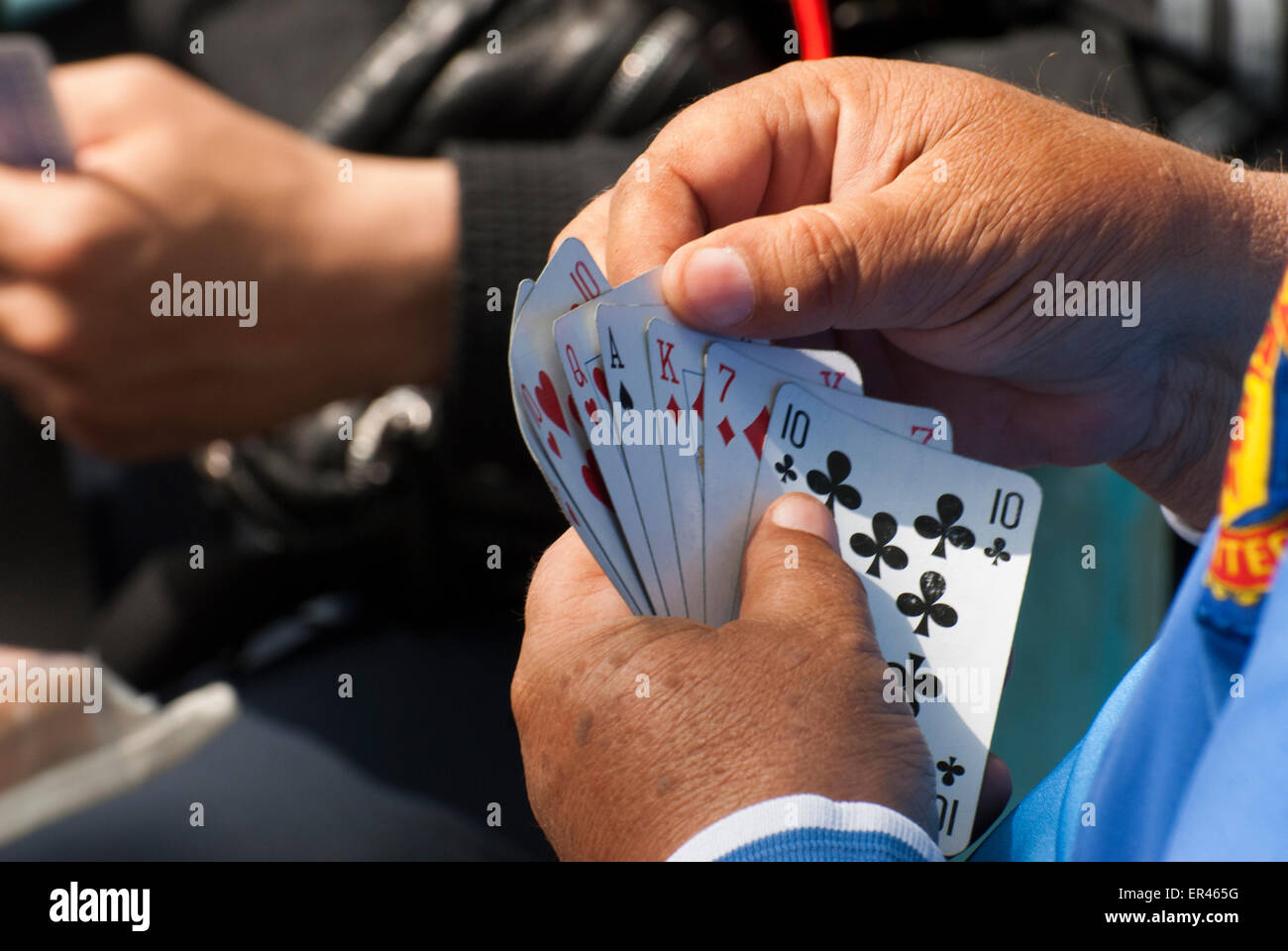 People playing cards hi-res stock photography and images - Alamy
