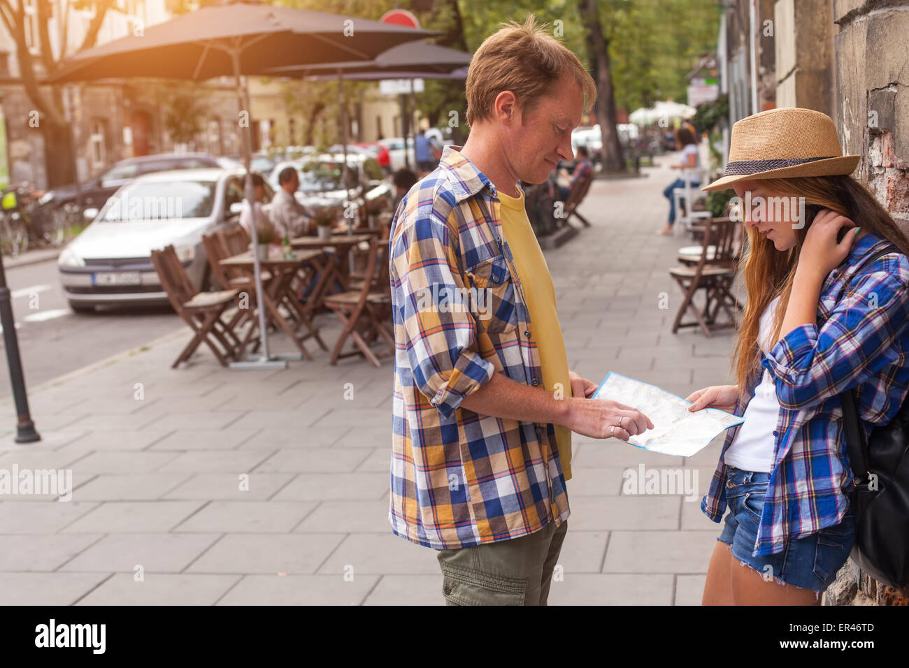 Tourists camera map hi-res stock photography and images - Alamy