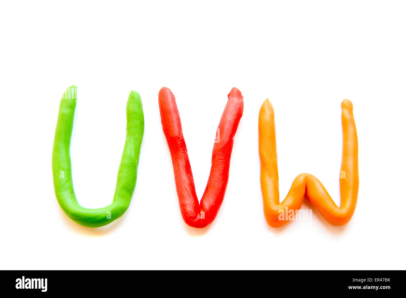 plasticine letters UVW isolated on white background Stock Photo - Alamy
