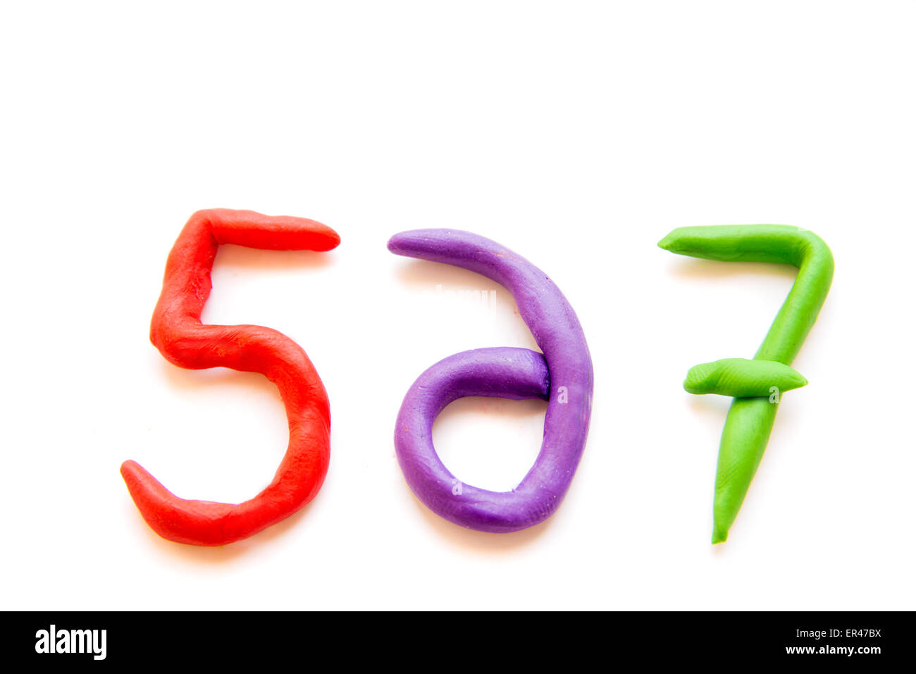 plasticine digits (signs, letters) isolated on white background Stock ...