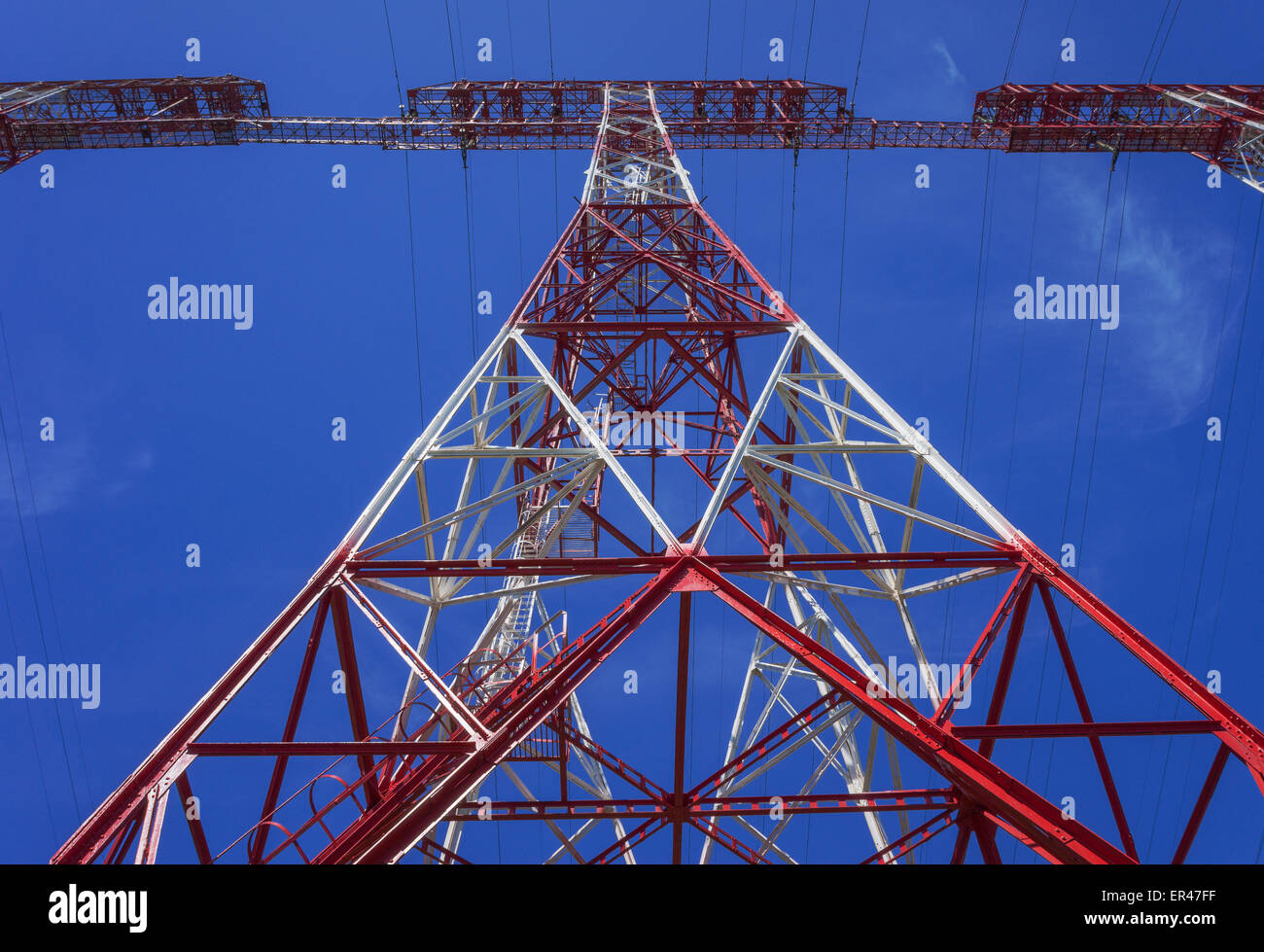 Powerful power line on background blue sky Stock Photo - Alamy