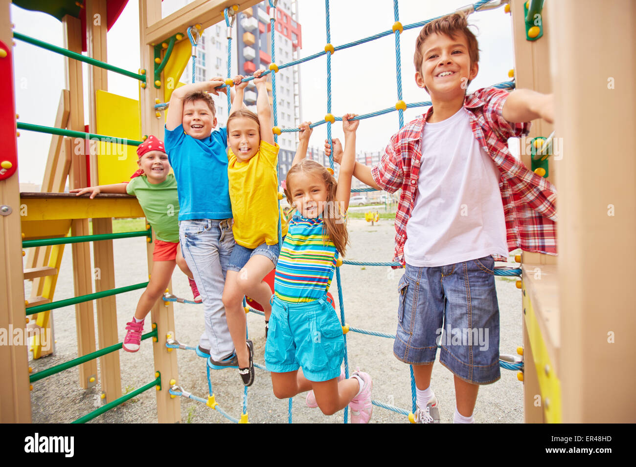 Group of friendly kids having fun outdoors Stock Photo - Alamy