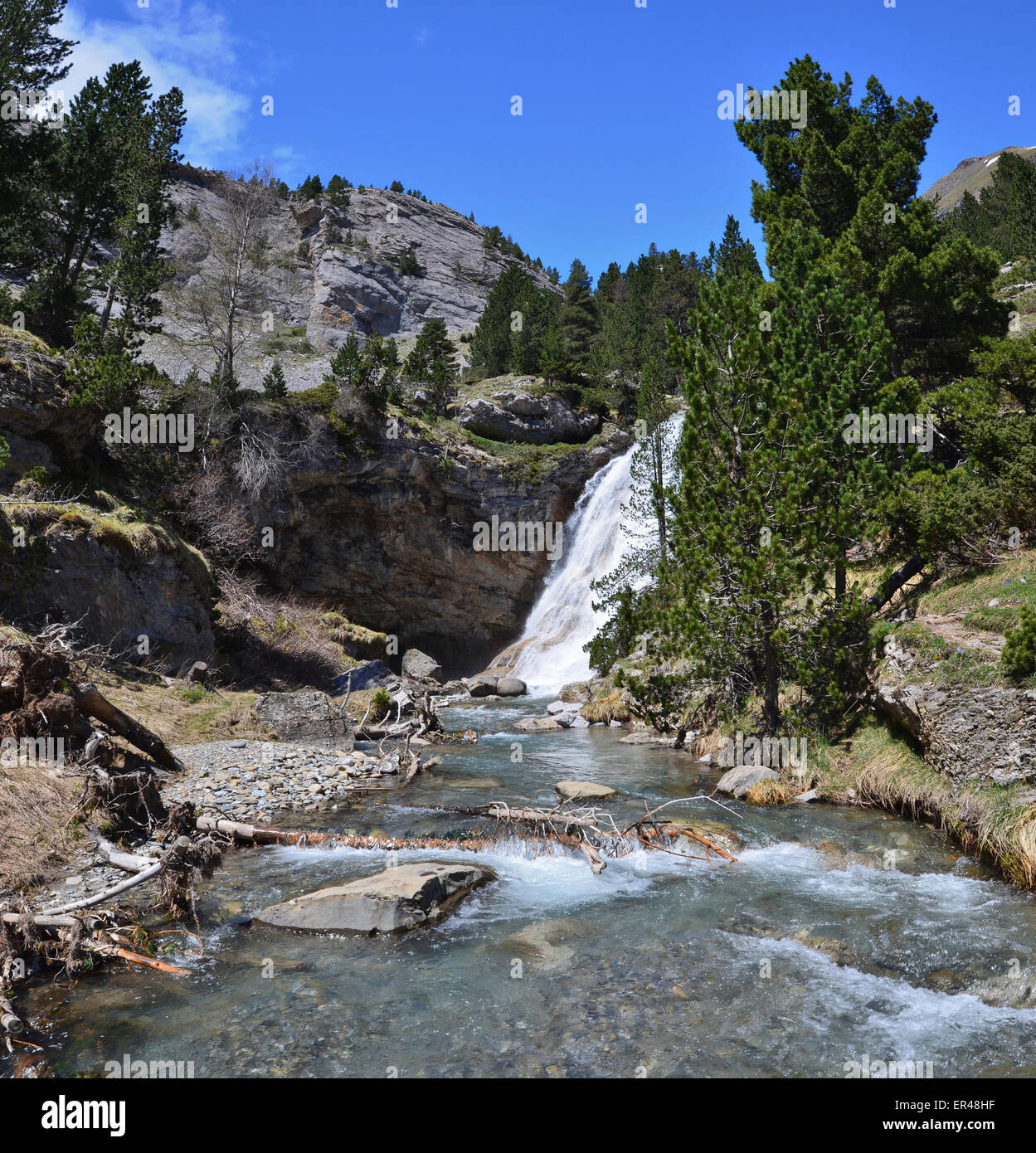 Waterfall in the spring valley of Gavarnie Stock Photo - Alamy