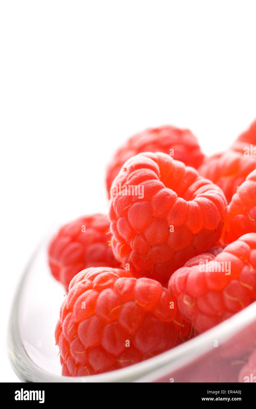 Ripe raspberries isolated on white background Stock Photo - Alamy