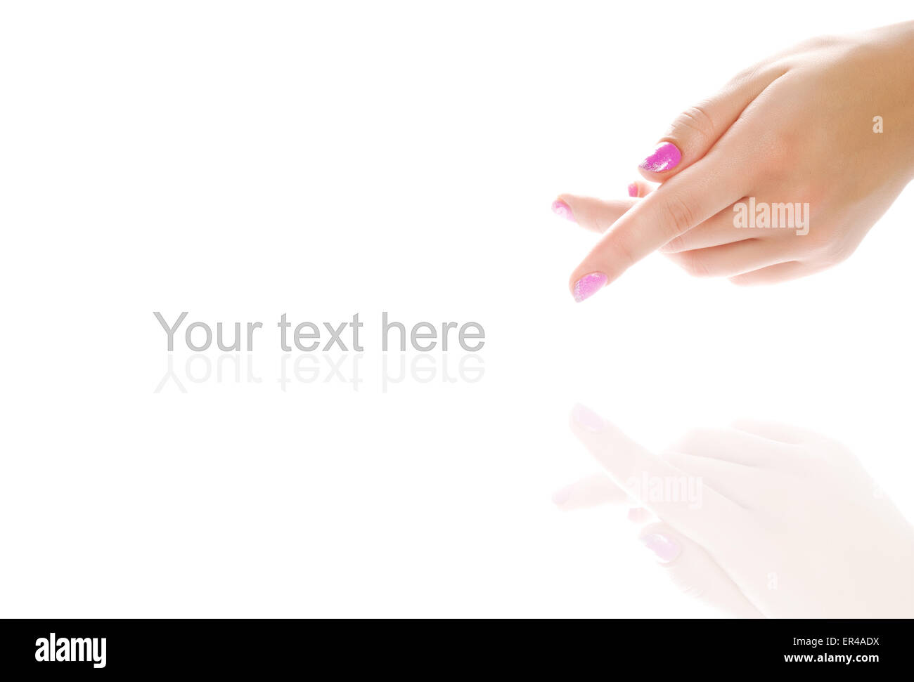 Beautiful woman's hand pointing to something isolated on white ...