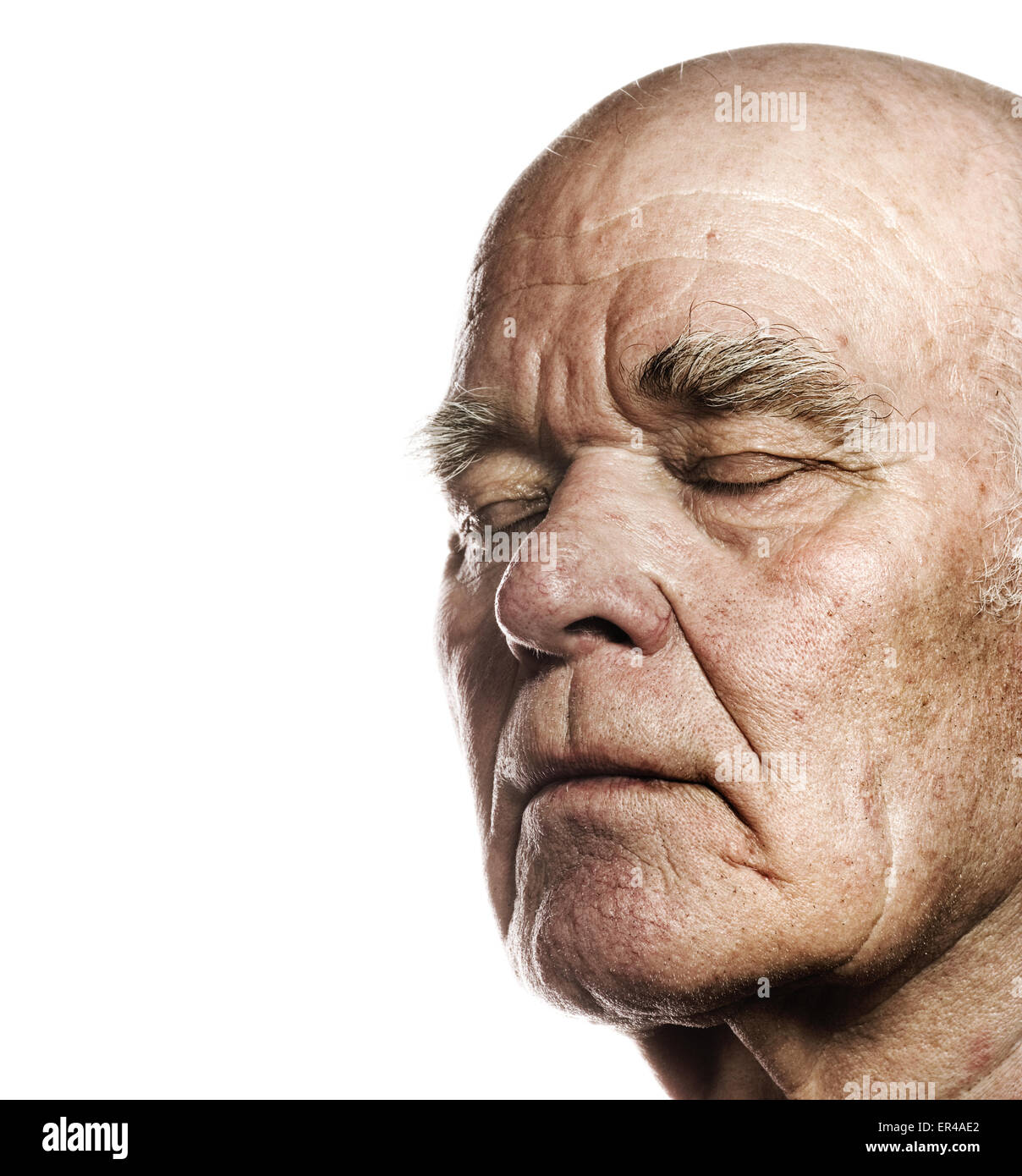 Elderly man's face over white background Stock Photo - Alamy