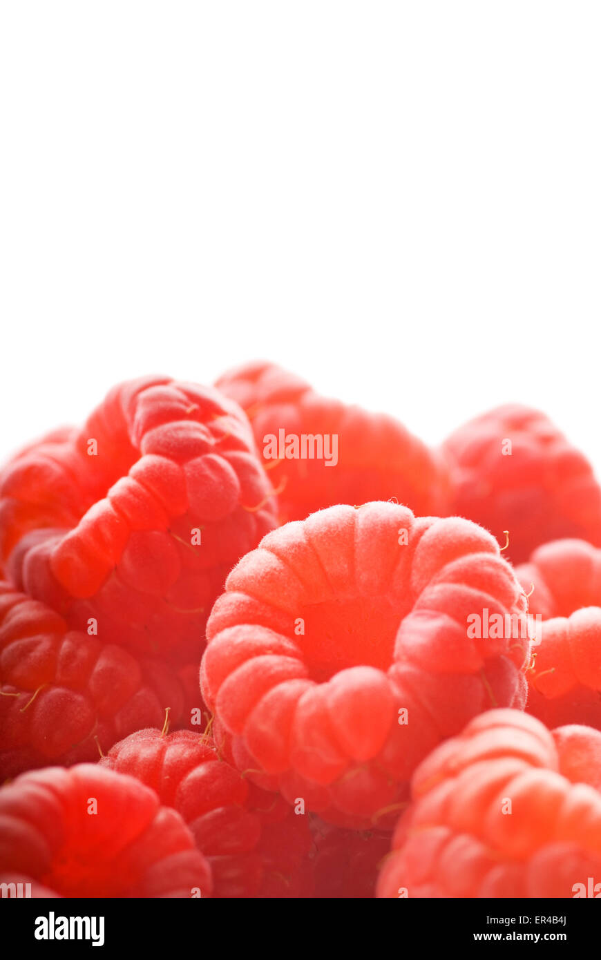 Ripe raspberries isolated on white background Stock Photo - Alamy
