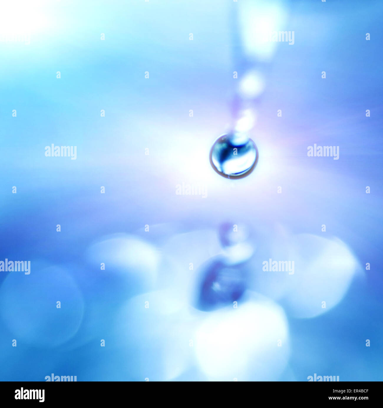 Falling water drop (shallow DoF Stock Photo - Alamy