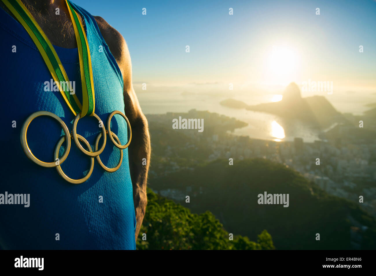 RIO DE JANEIRO, BRAZIL - MARCH 05, 2015: Athlete wearing Olympic rings ...