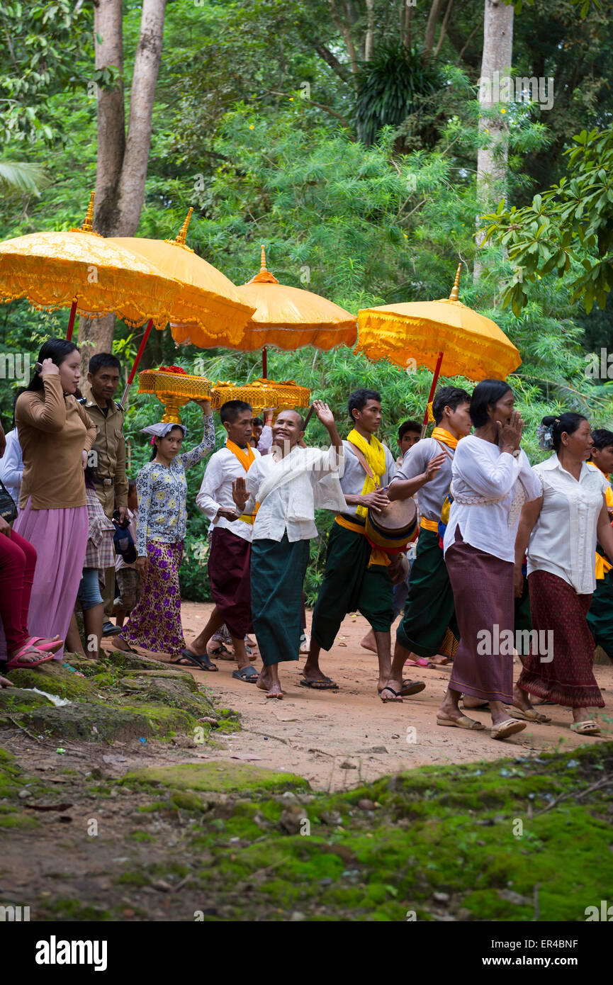 SIEM REAP, CAMBODIA - OCTOBER 20, 2014: Group of Buddhists walk ...