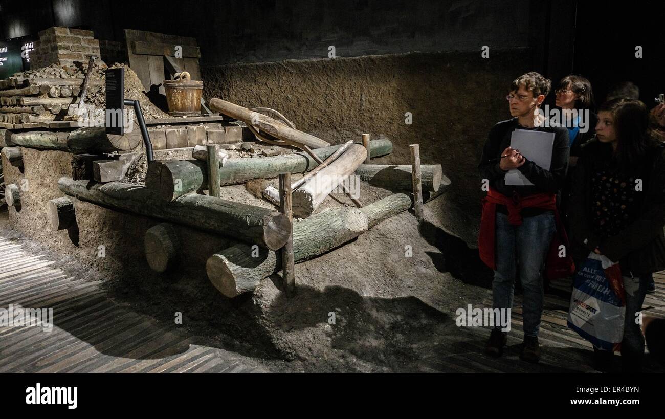 An installation showing the pile foundations of the first houses of the ...
