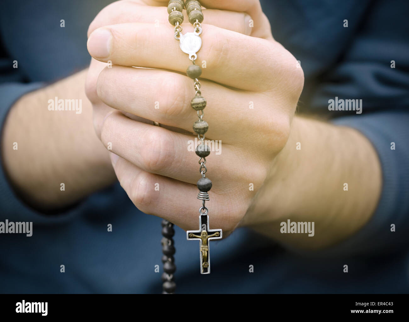Close up rosary in hands hi-res stock photography and images - Alamy