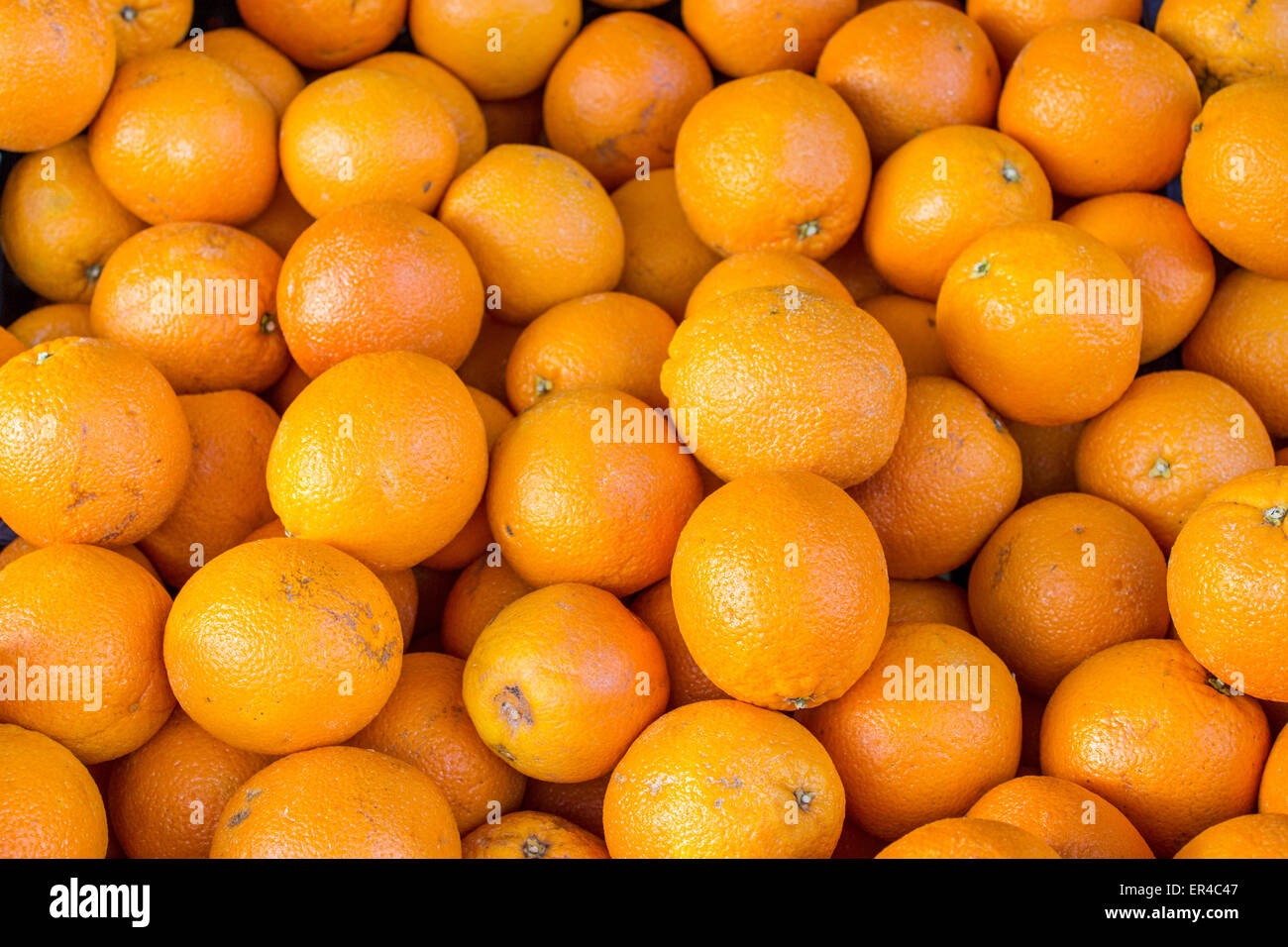 Display with lots of fresh oranges Stock Photo - Alamy
