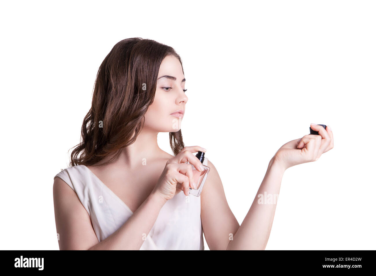 young woman enjoying a smell of the perfume Stock Photo - Alamy