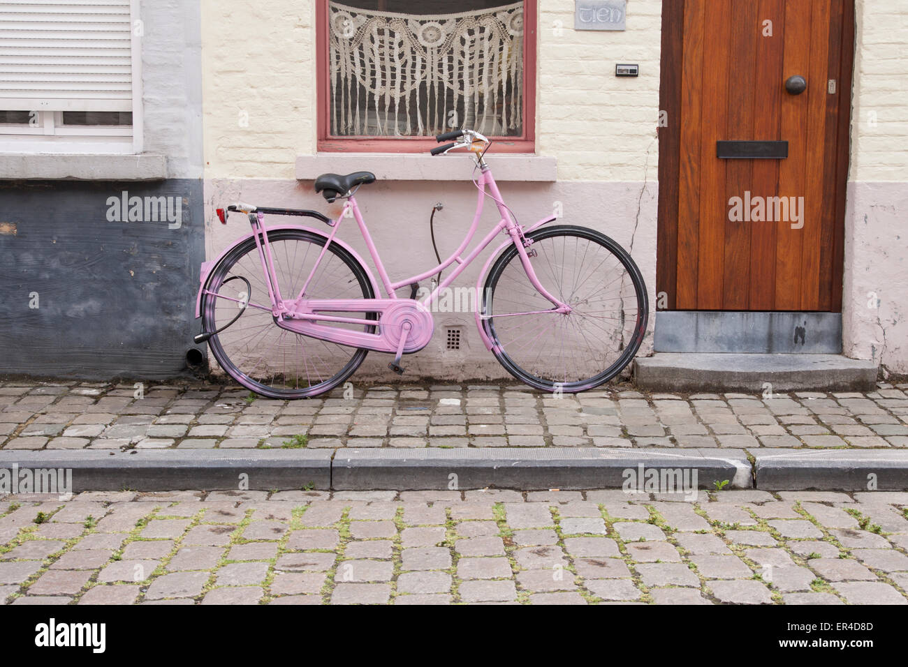 Bike propped against a wall hi-res stock photography and images - Alamy