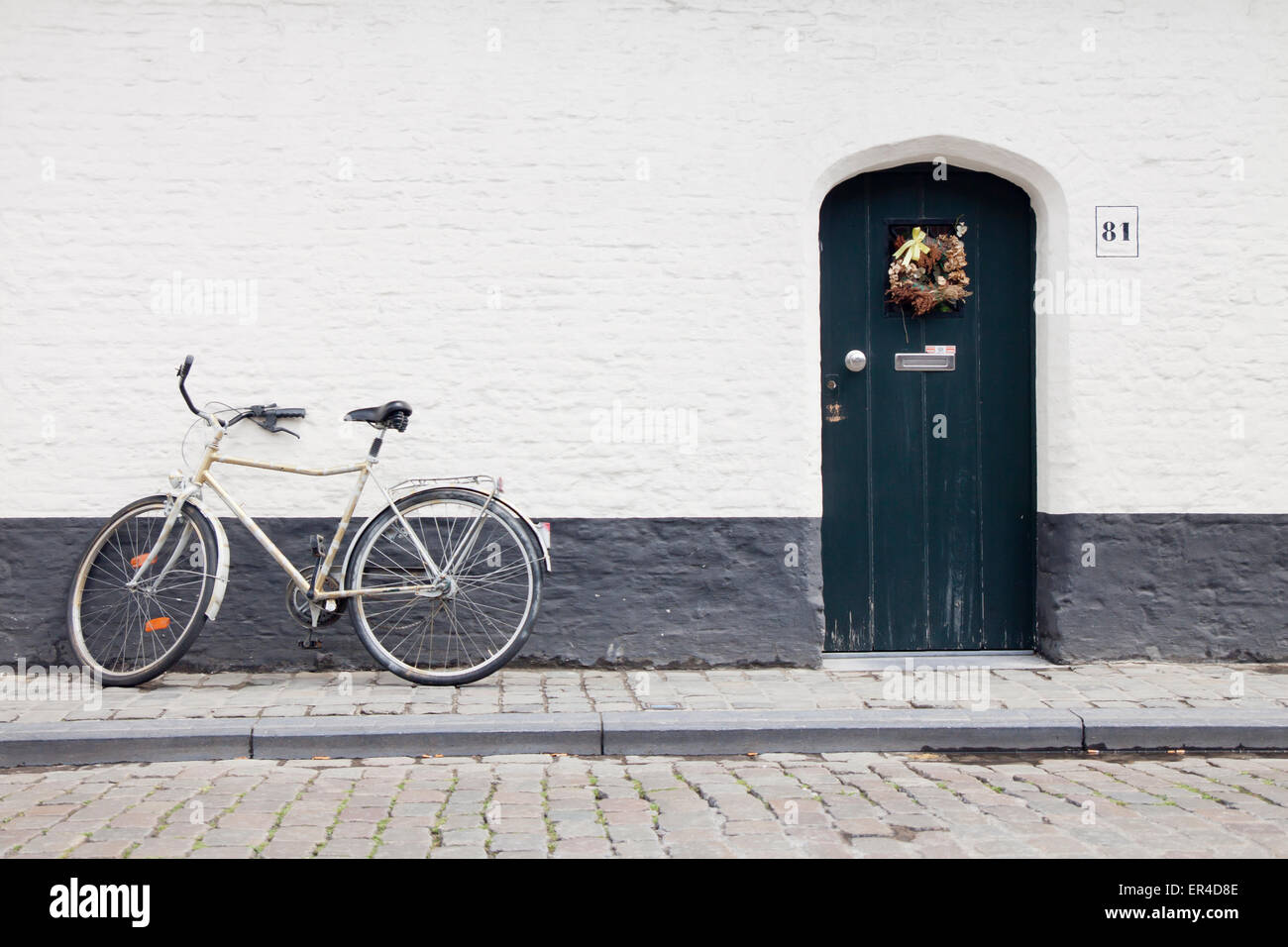 Bike propped against a wall hi-res stock photography and images - Alamy
