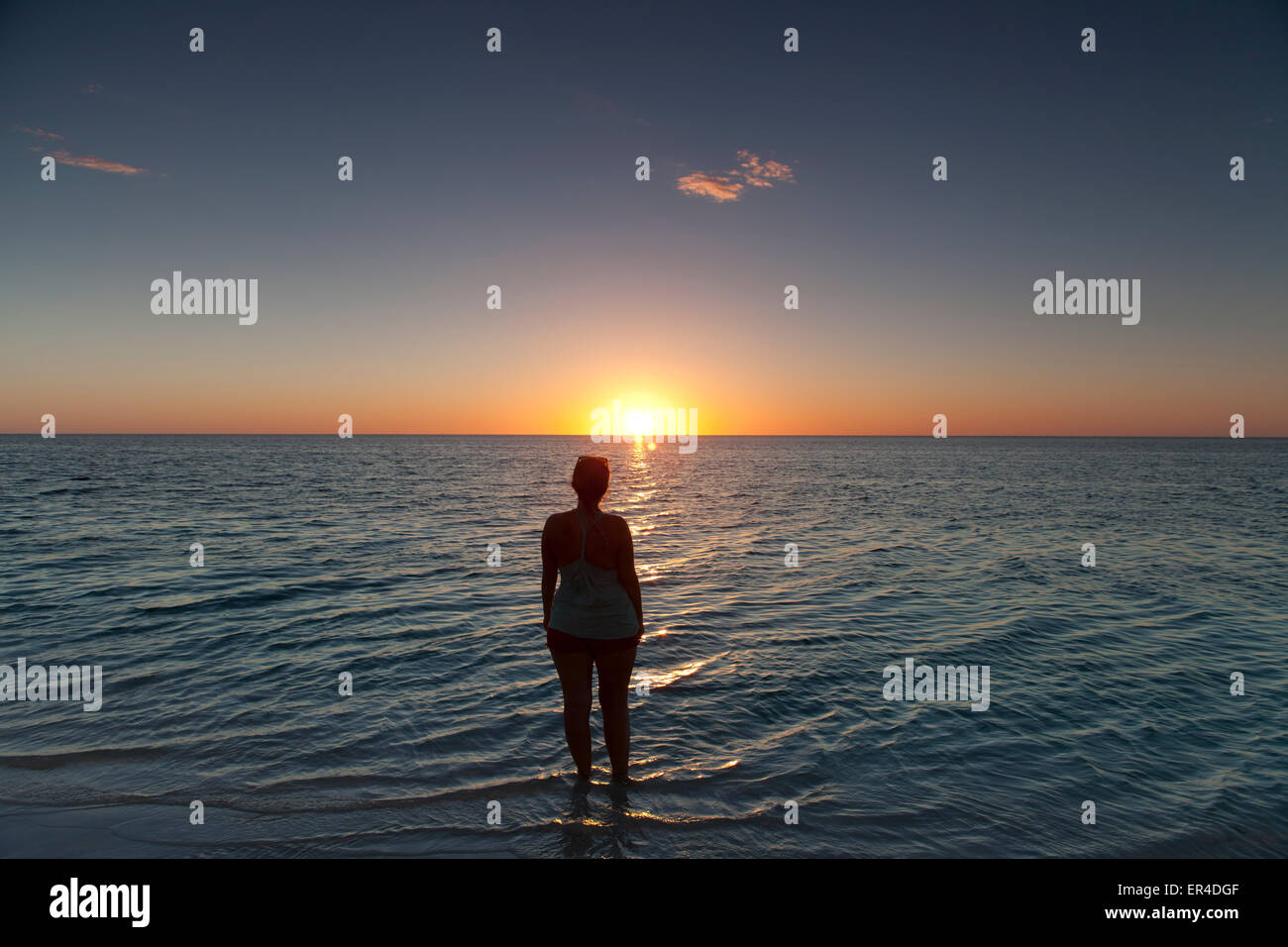 Sunset on the beach at Coral Bay in Western Australia Stock Photo - Alamy