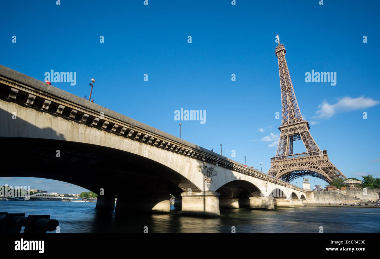 The Eiffel Tower and bridge over Seine River in Paris Stock Photo - Alamy