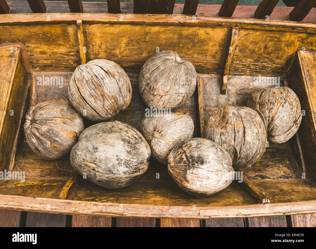 Wooden boat full with coconuts Stock Photo - Alamy