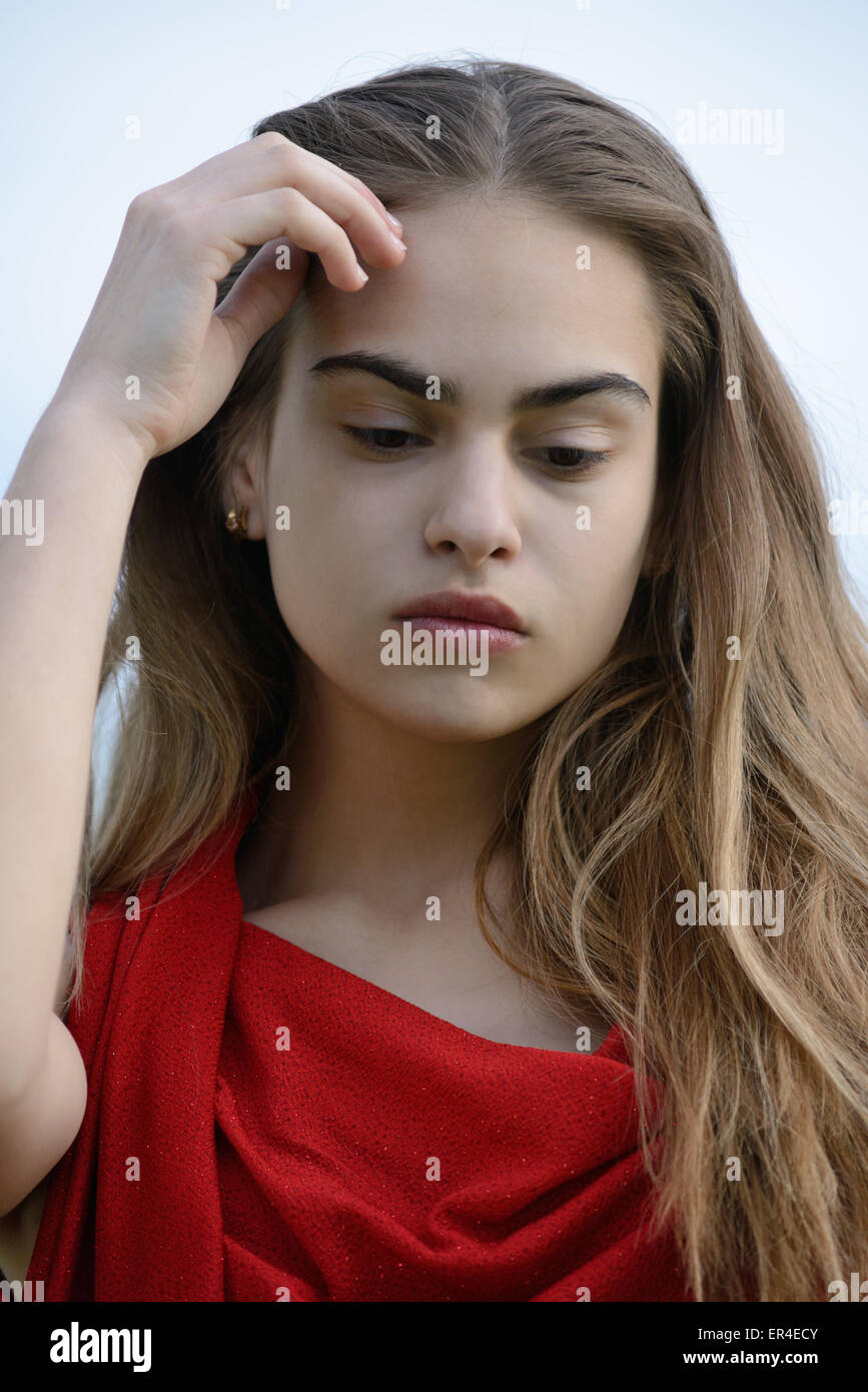 strong beauty, woman in red Stock Photo - Alamy