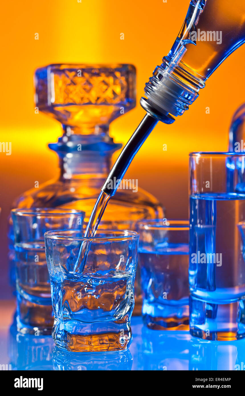 vodka in bar on a glass table Stock Photo - Alamy