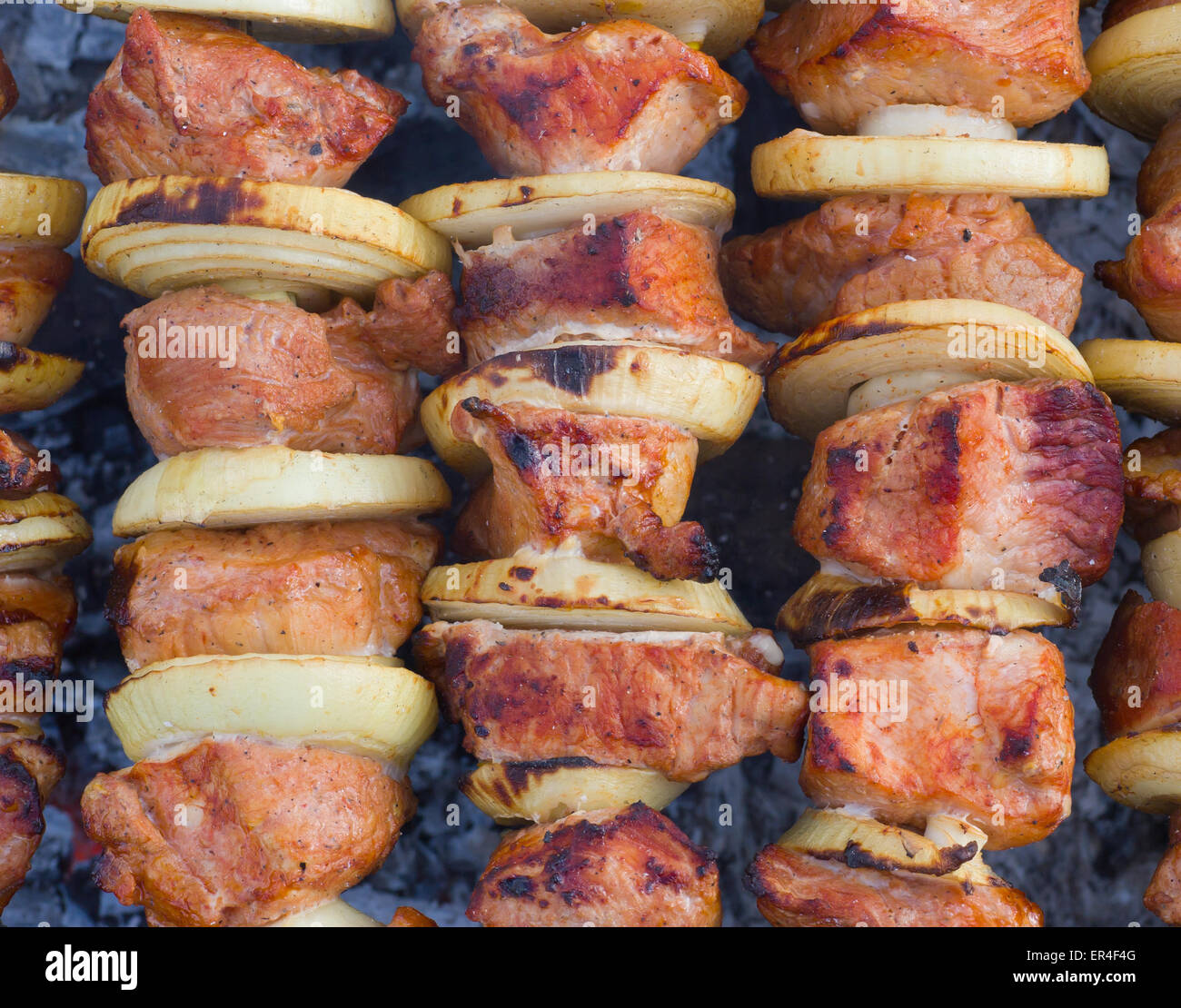 Shashlik - Georgian meal with meat and vegetables cooked on smouldering ...