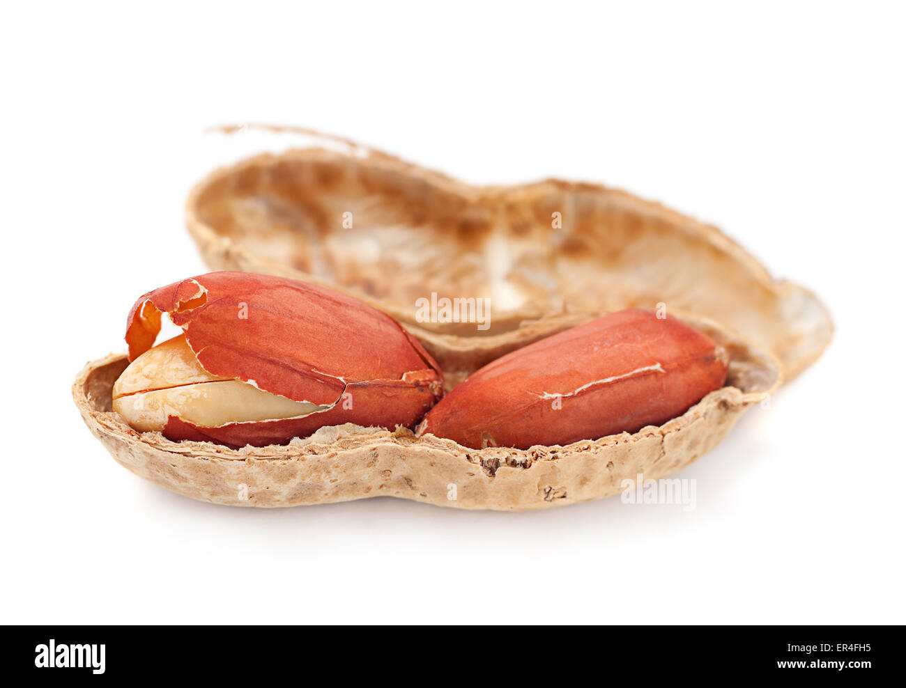 Peanut with shell colseup isolated on white Stock Photo - Alamy