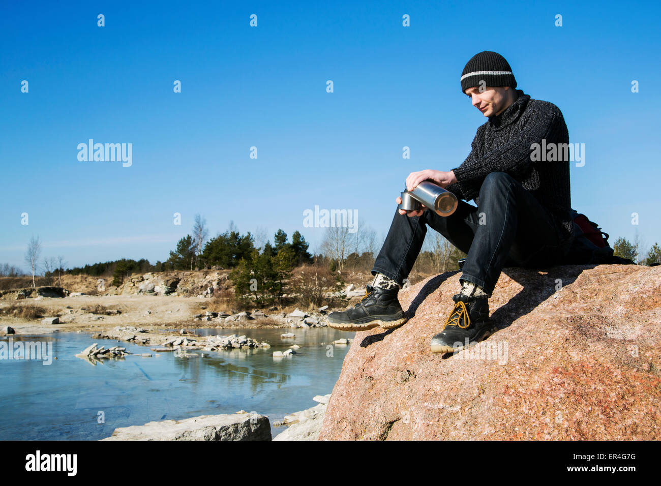 A male adventurer enjoying the sunny weather Stock Photo - Alamy