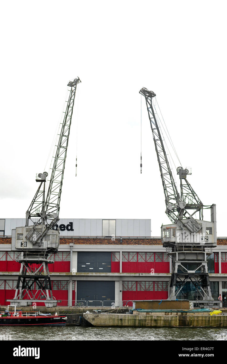 Two of the preserved steam cranes outside the M Shed museum in Bristol ...