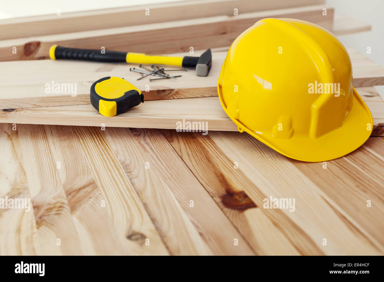 Builders hand measuring tape hi-res stock photography and images - Alamy