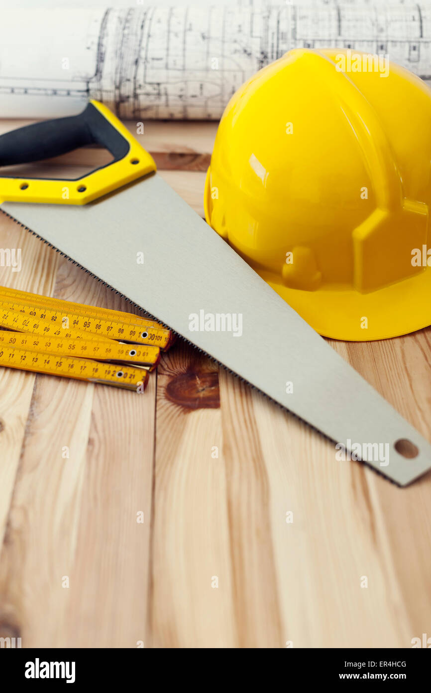 Builders hand measuring tape hi-res stock photography and images - Alamy