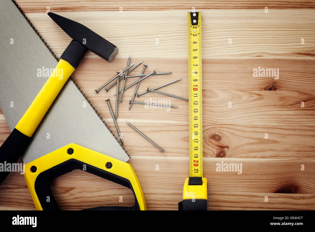 Builders hand measuring tape hi-res stock photography and images - Alamy